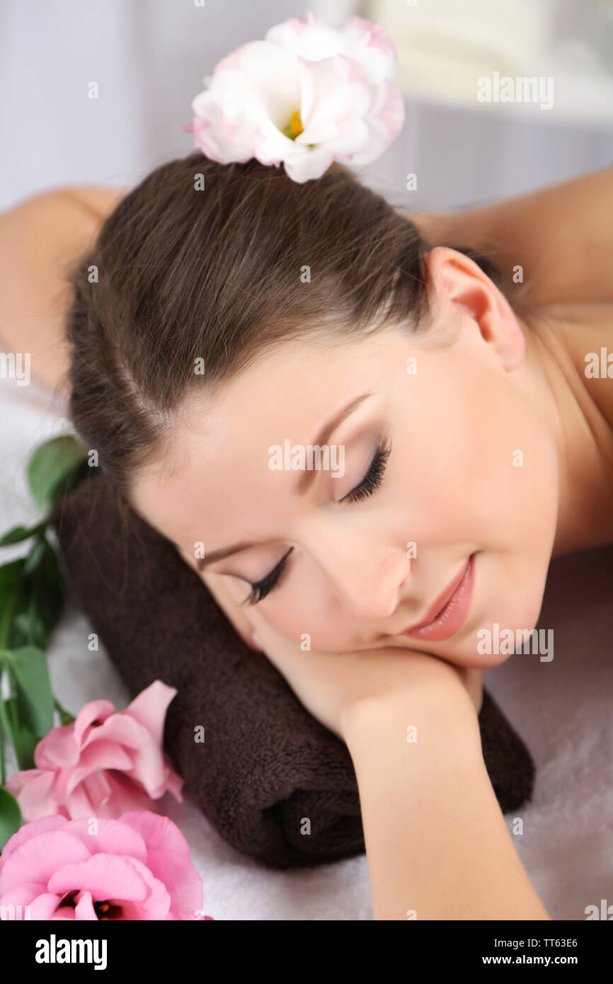 Beautiful young woman having relax in spa salon Stock Photo - Alamy