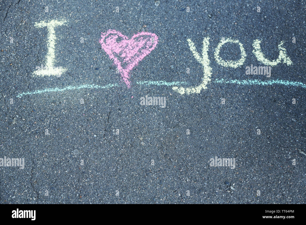 I love you words, written on pavement Stock Photo - Alamy