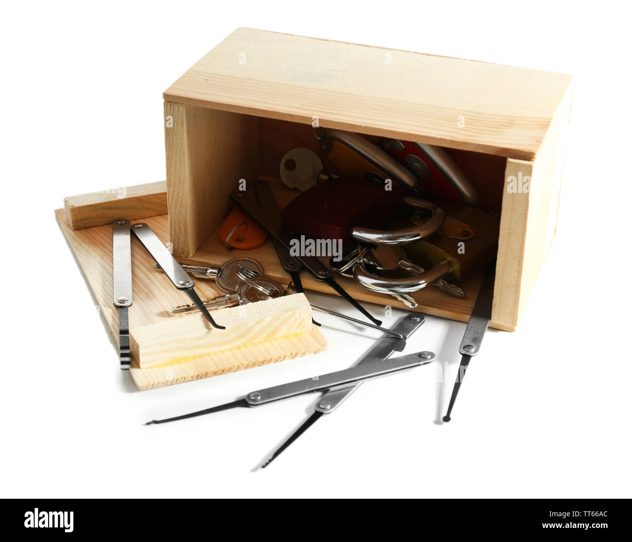 Set of keys and lock picks in wooden box isolated on white Stock Photo ...
