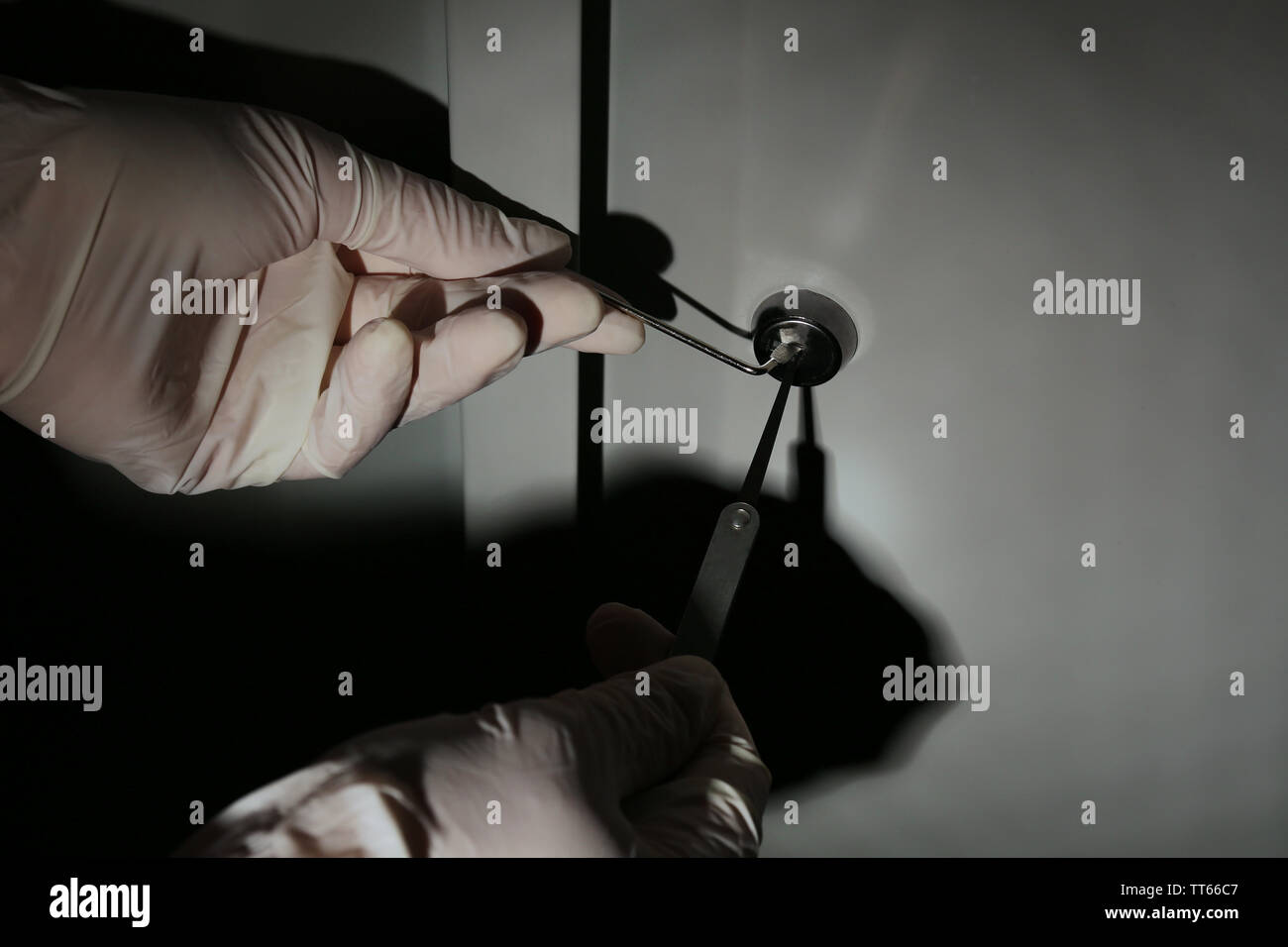 Picking a lock Stock Photo - Alamy