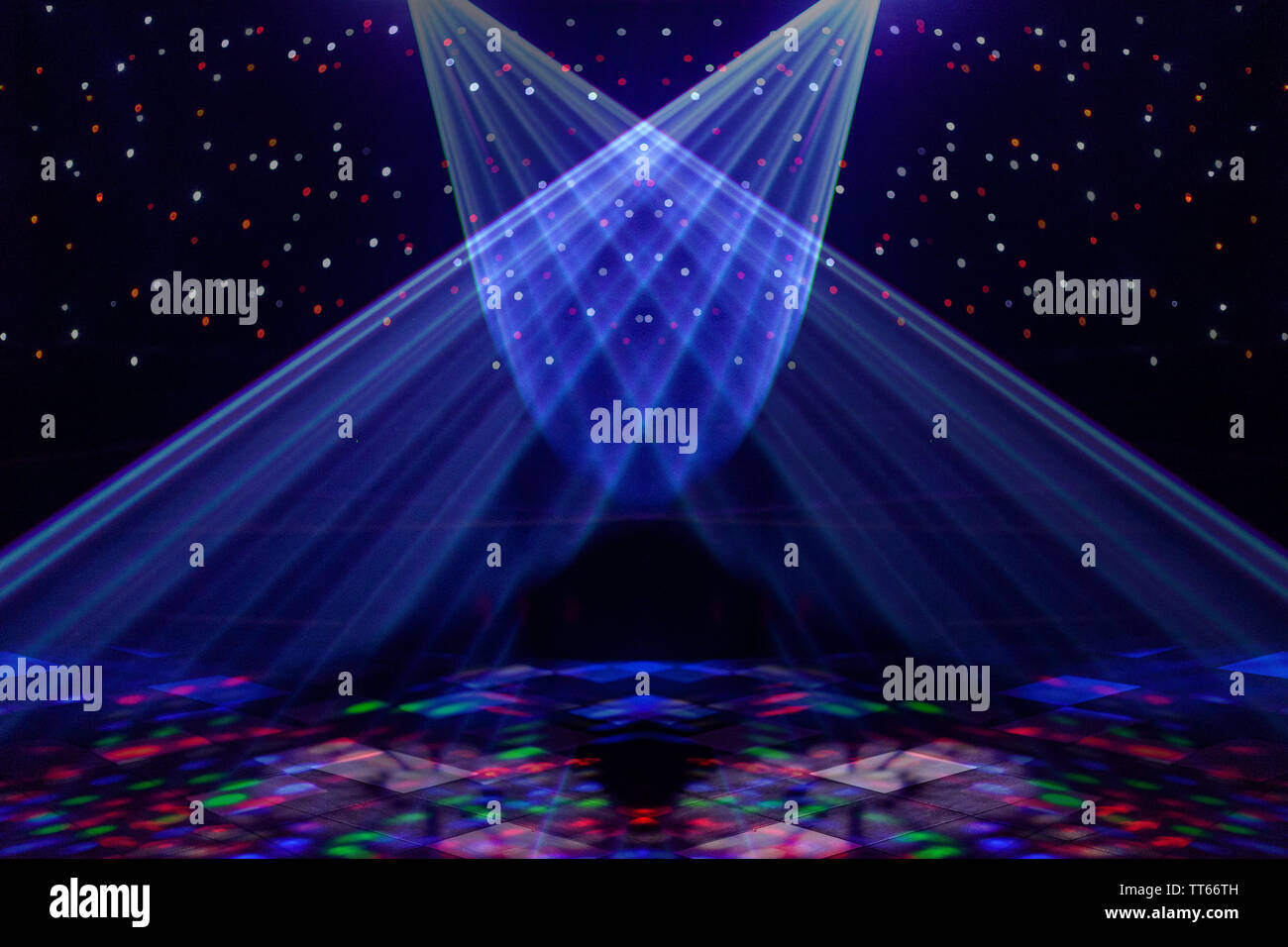 Bright nightclub purple, white, blue laser lights cutting through smoke ...