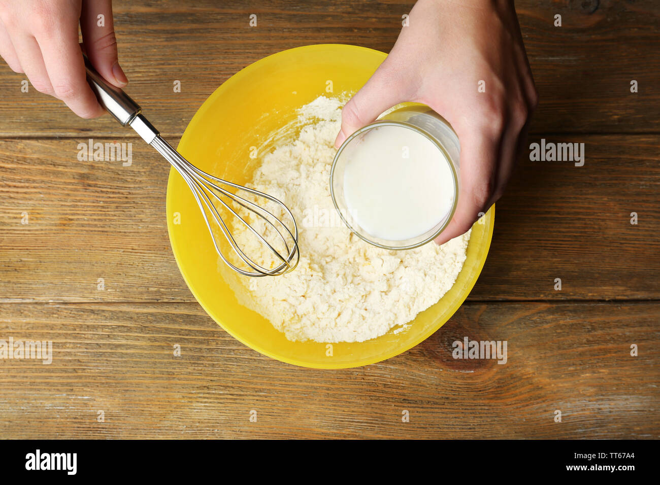 Preparing dough, mixing ingredients Stock Photo - Alamy