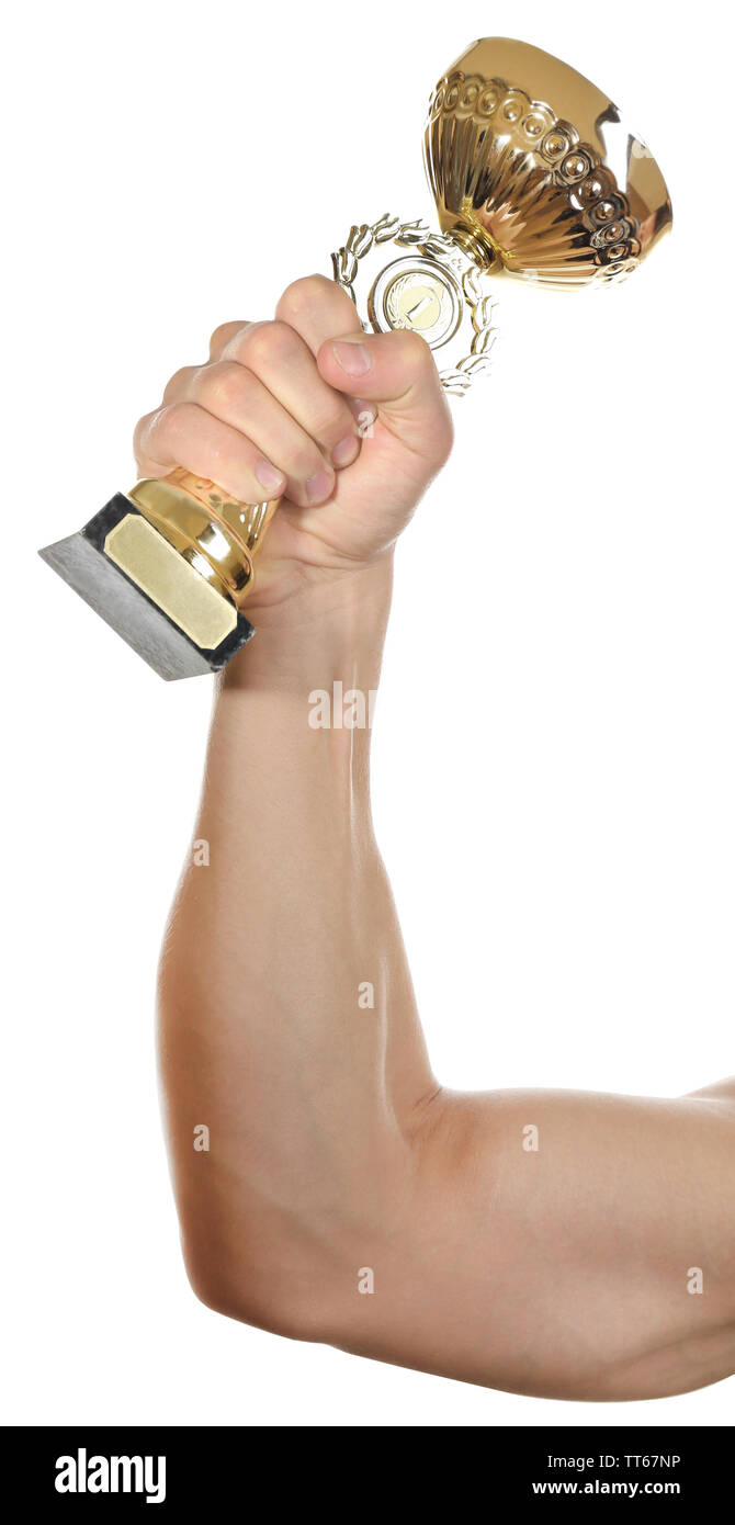 Gold cup in hand isolated on white Stock Photo - Alamy