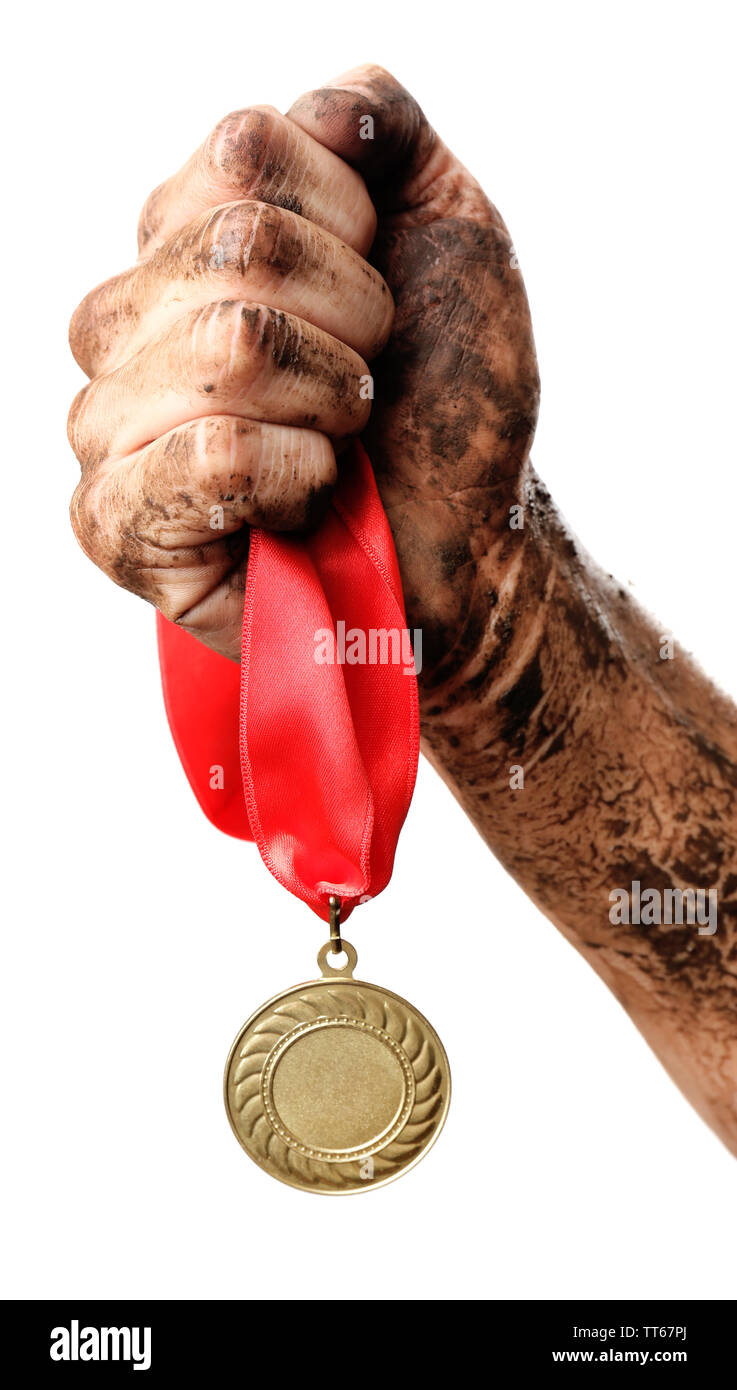 Golden medal in hand isolated on white Stock Photo - Alamy