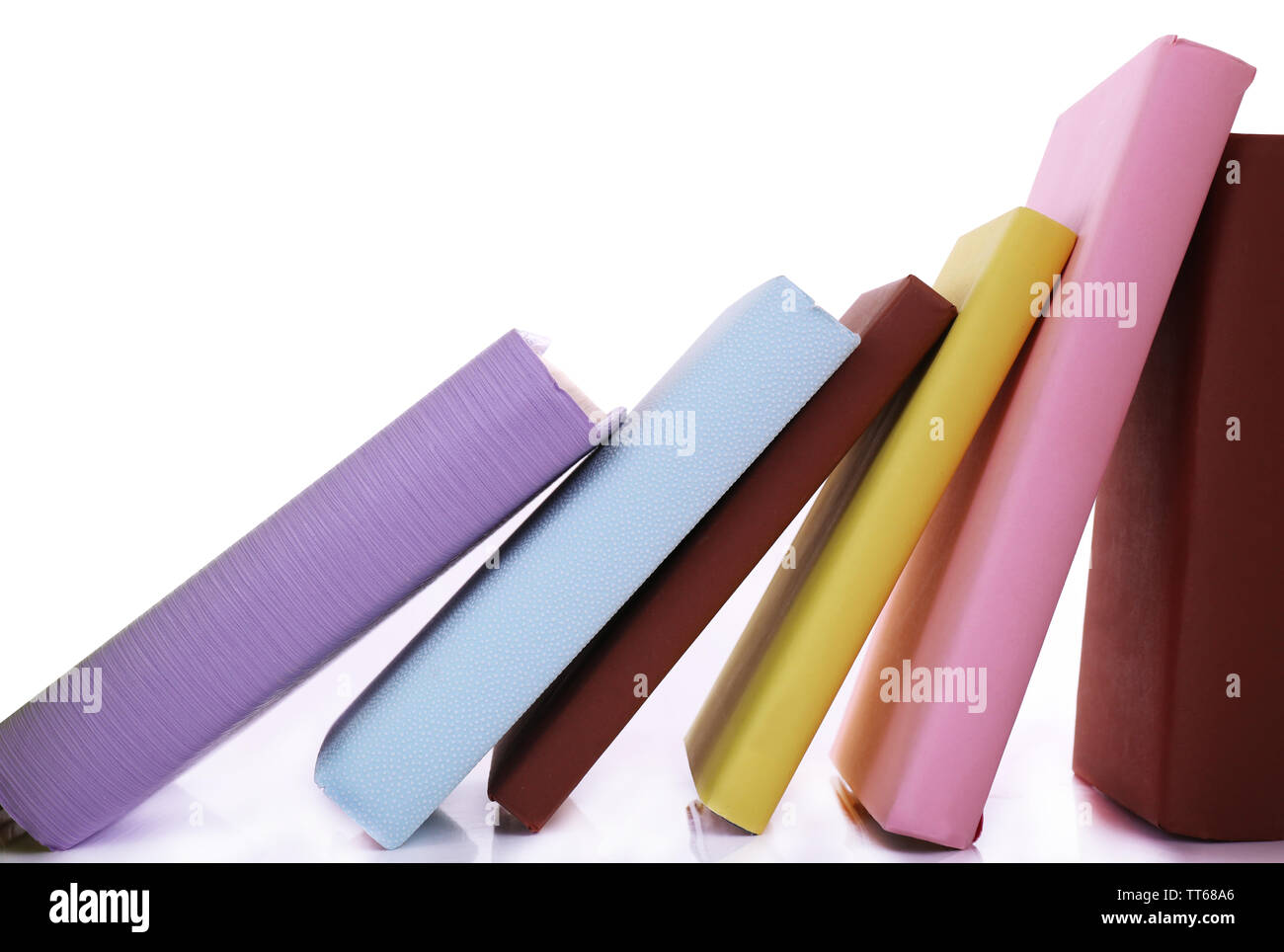 Falling books isolated on white Stock Photo - Alamy