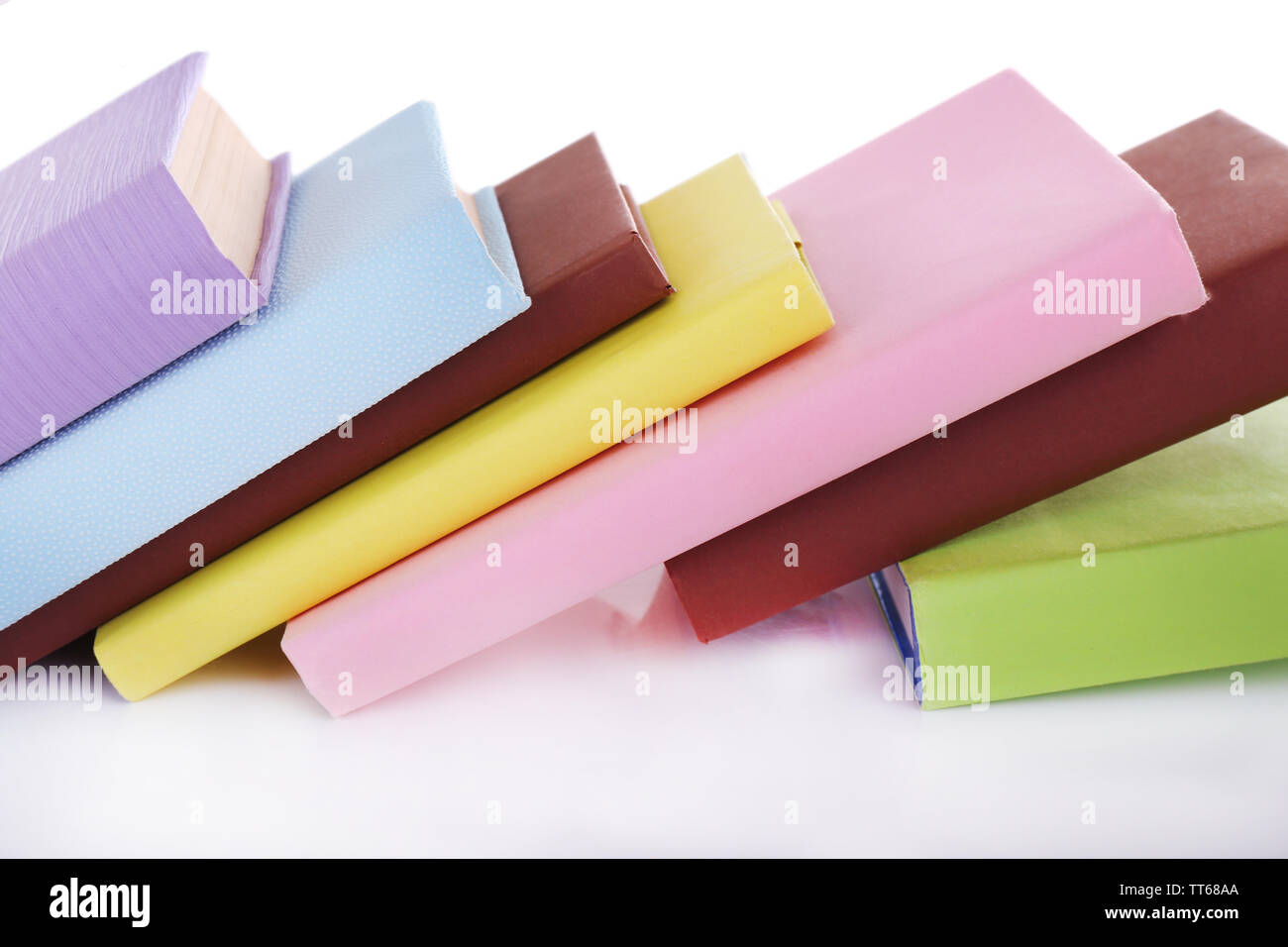 Falling books isolated on white Stock Photo - Alamy