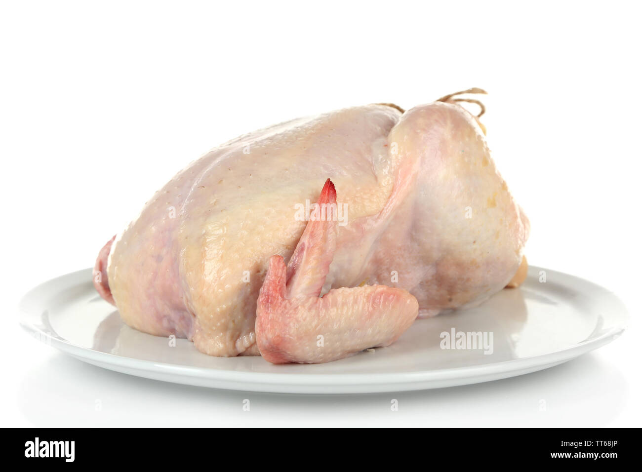 Raw chicken isolated on white Stock Photo - Alamy