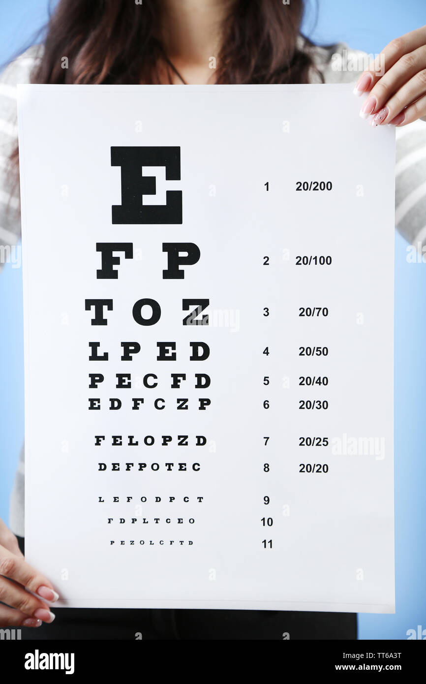 Health care, medicine and vision concept - woman with eye chart Stock ...