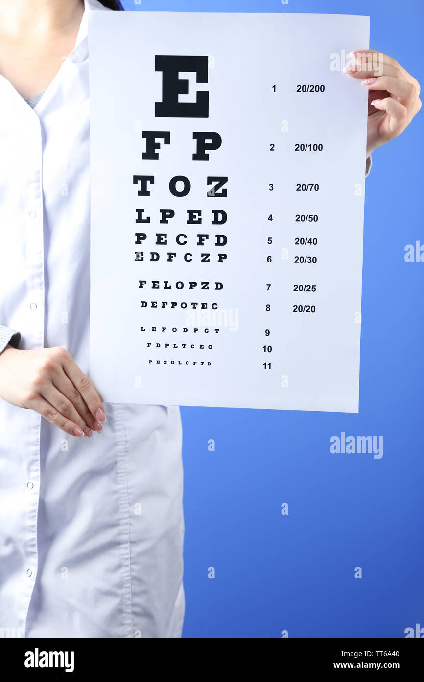 Health care, medicine and vision concept - woman with eye chart Stock ...