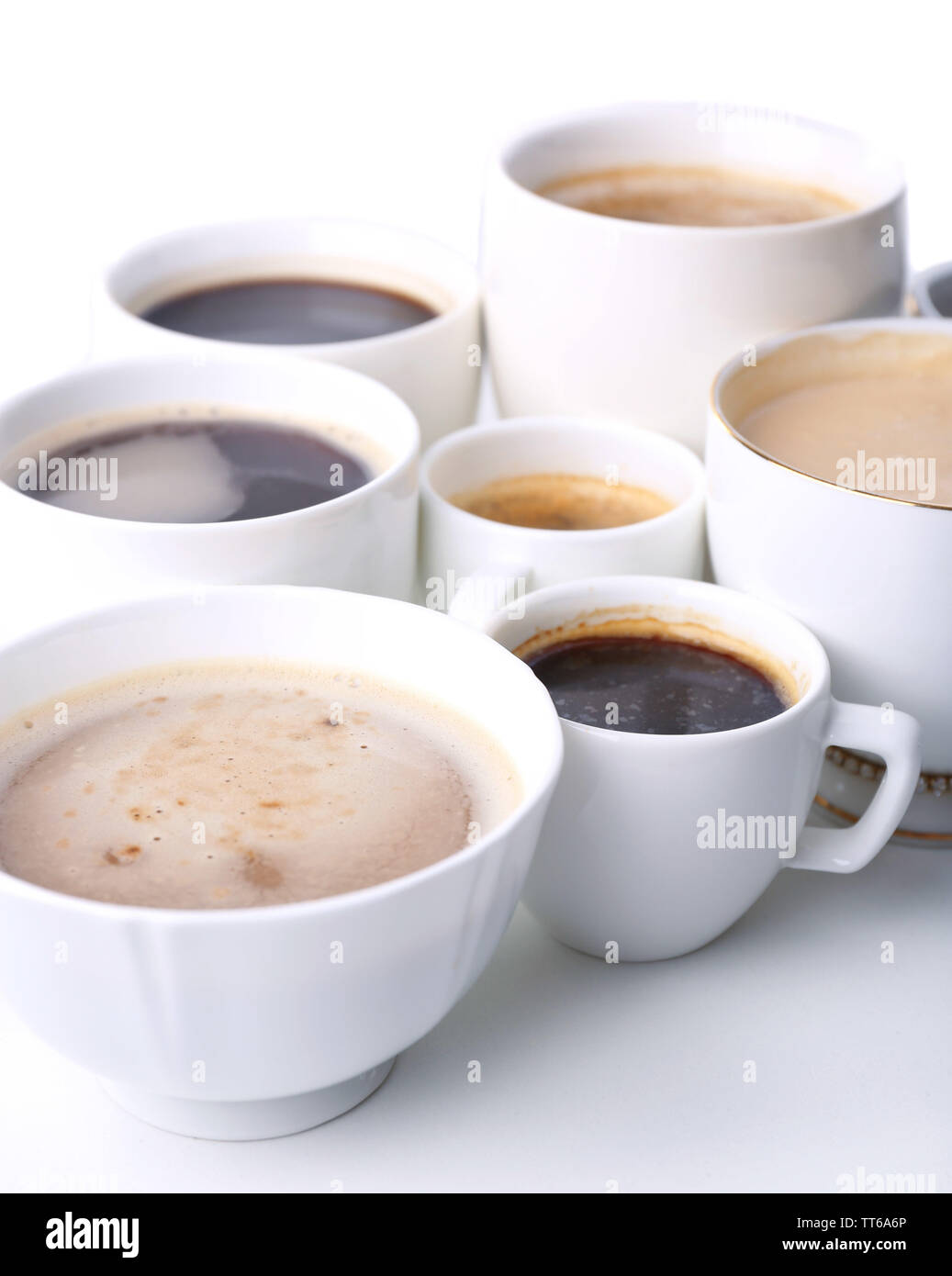 Lots of coffee cups on white background Stock Photo - Alamy