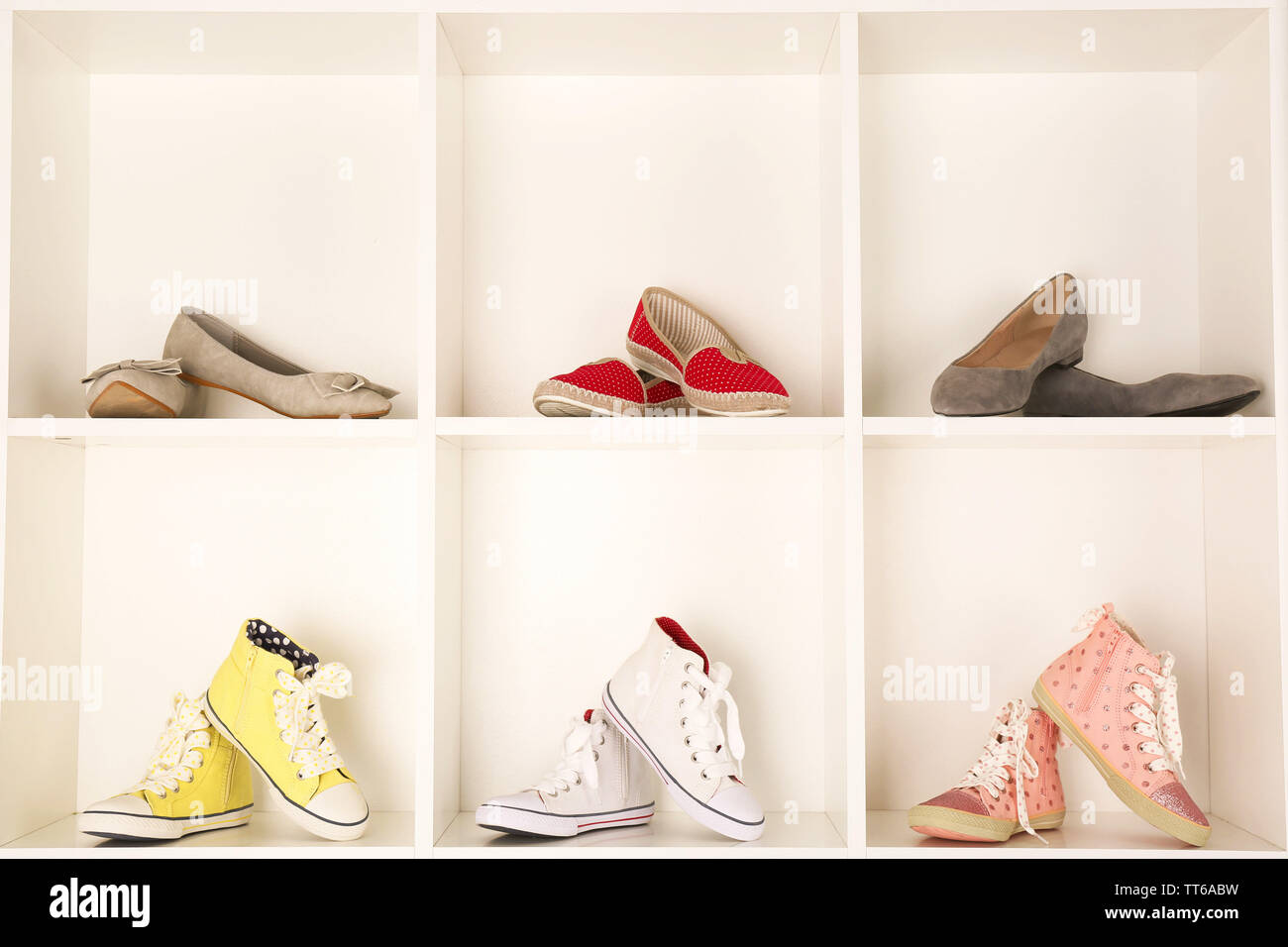 Collection of shoes on shelves Stock Photo - Alamy