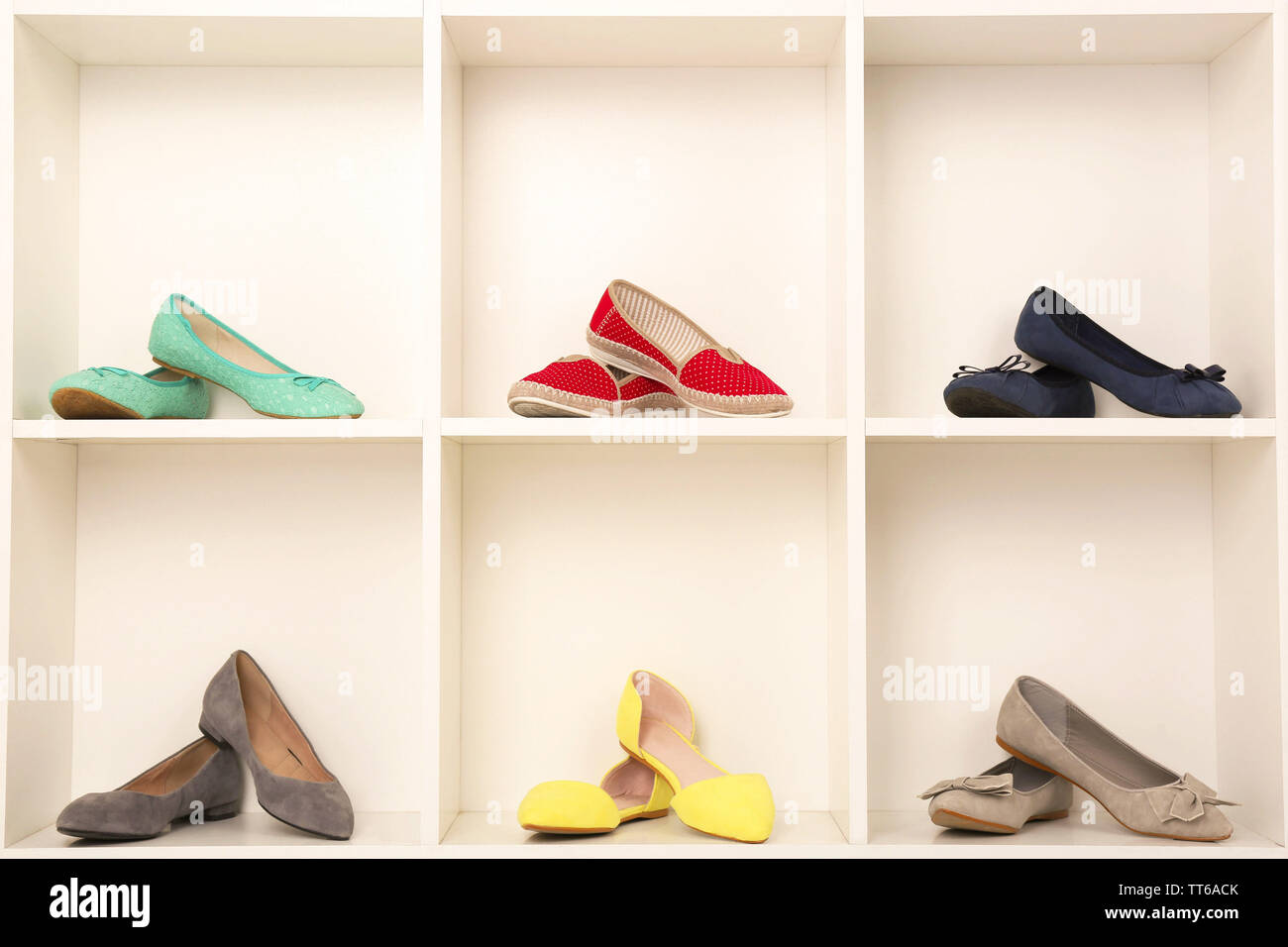 Collection of shoes on shelves Stock Photo - Alamy