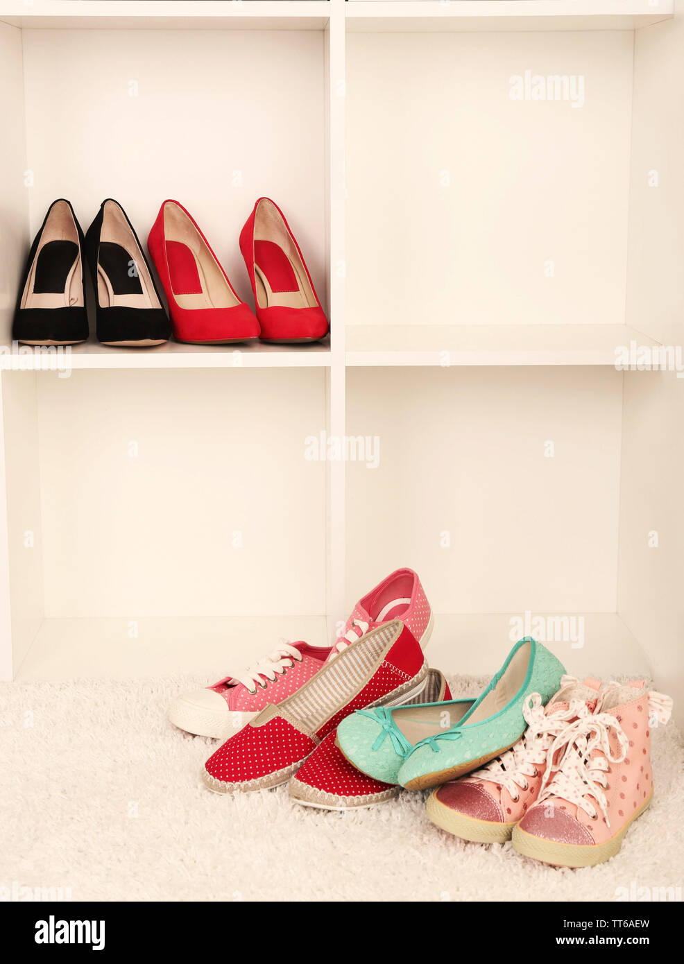 Collection of shoes on shelves Stock Photo - Alamy