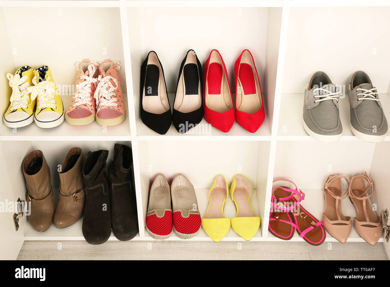 Collection of shoes on shelves Stock Photo - Alamy