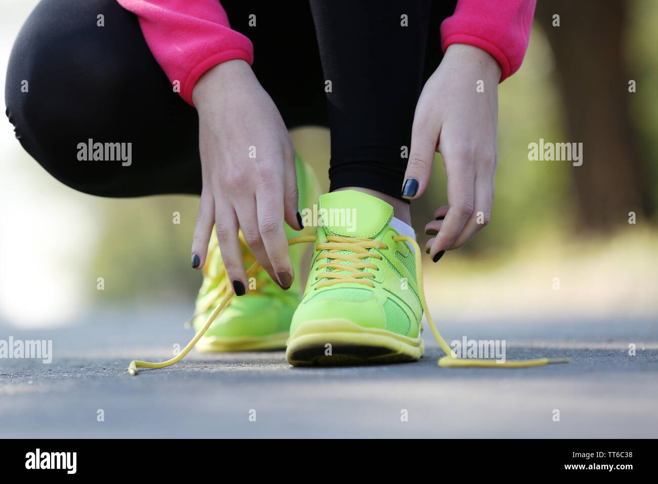 Runner feet on road, outdoors Stock Photo - Alamy