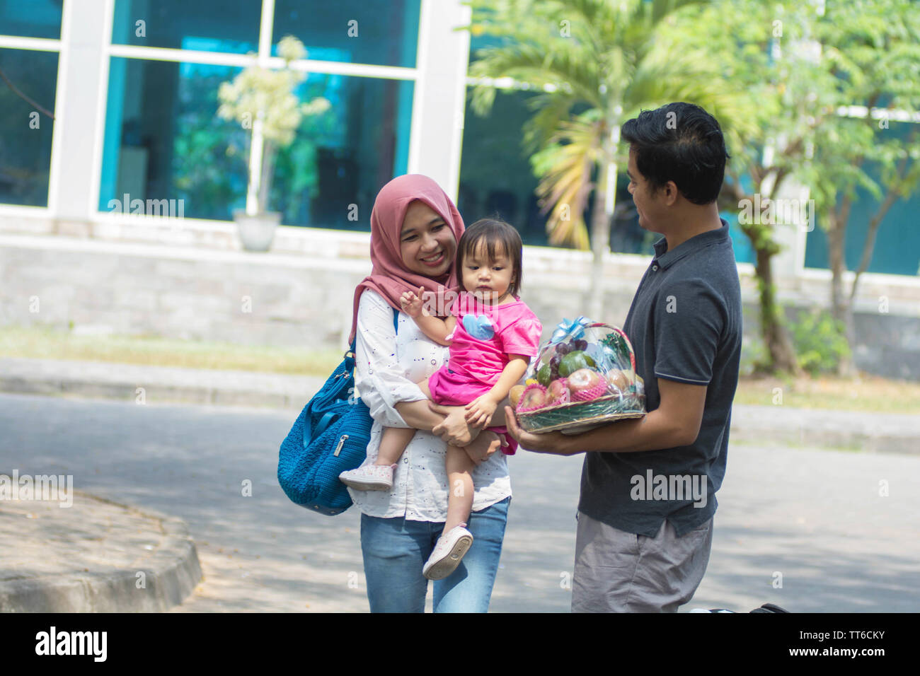young muslim family , transport, leisure, road trip and people concept ...