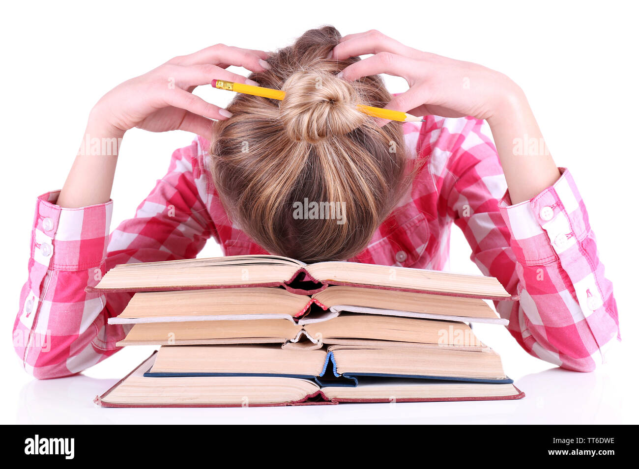 Tired girl with books isolated on white Stock Photo - Alamy