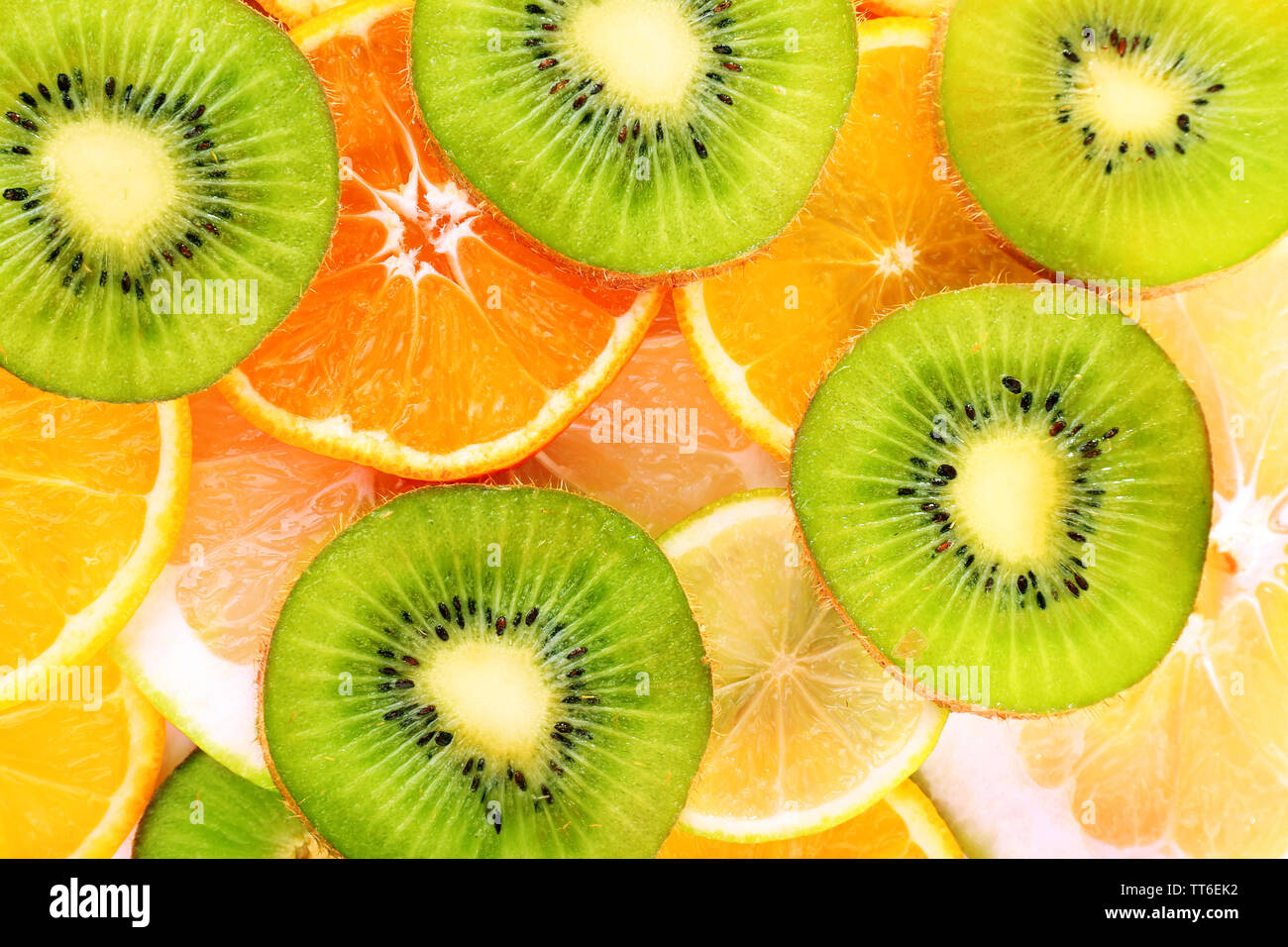 Sliced citrus close-up background Stock Photo - Alamy