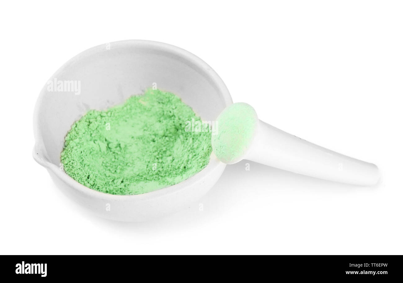 Laboratory pestle in mortar with ground material, isolated on white ...