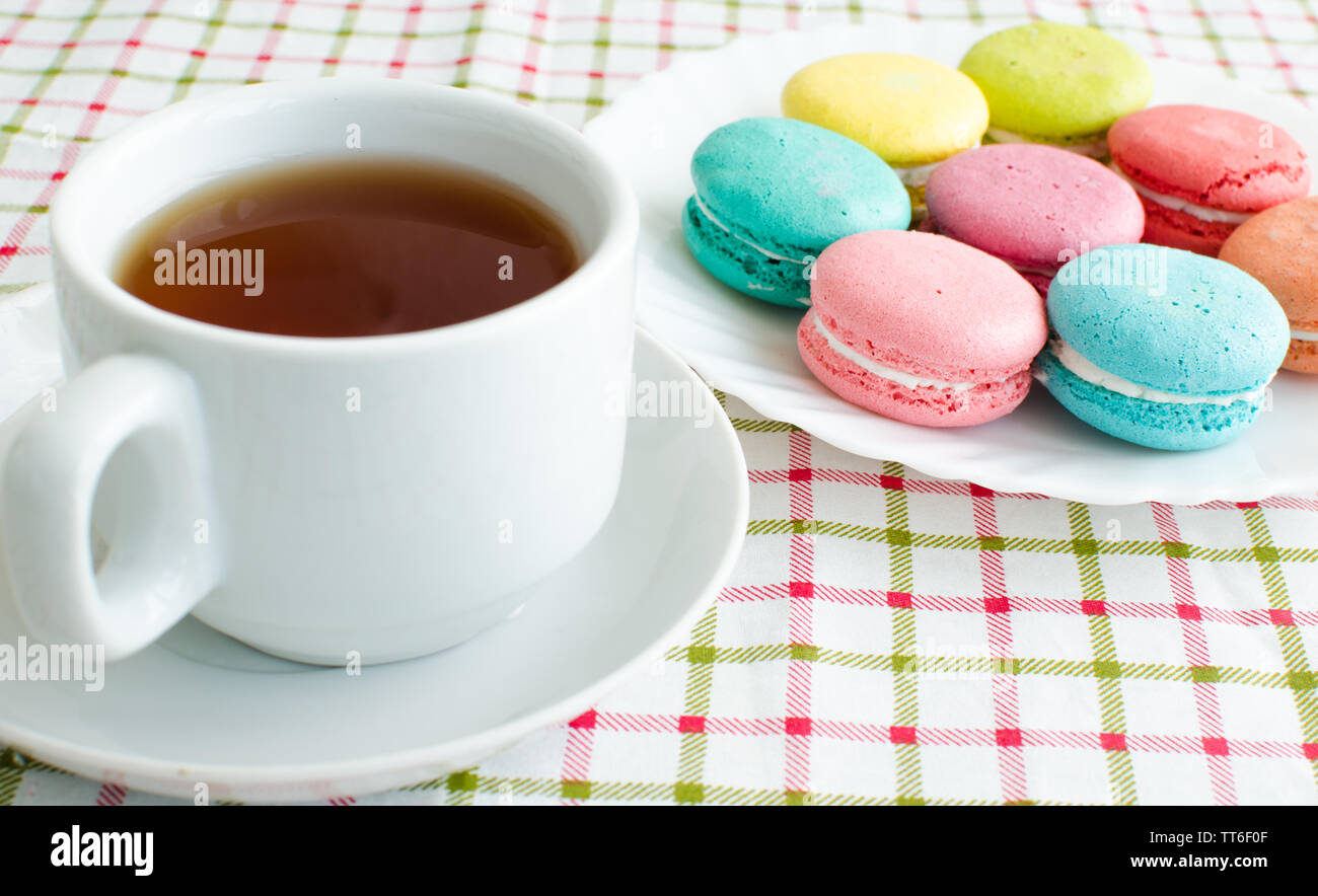 Cup tea french macaroons hi-res stock photography and images - Alamy