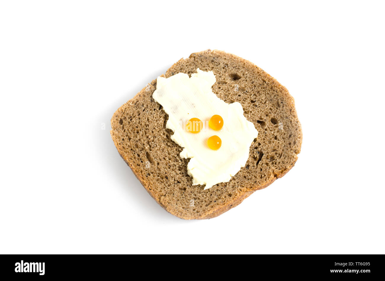The poor slice of bread with a small amount of butter and red caviar on ...