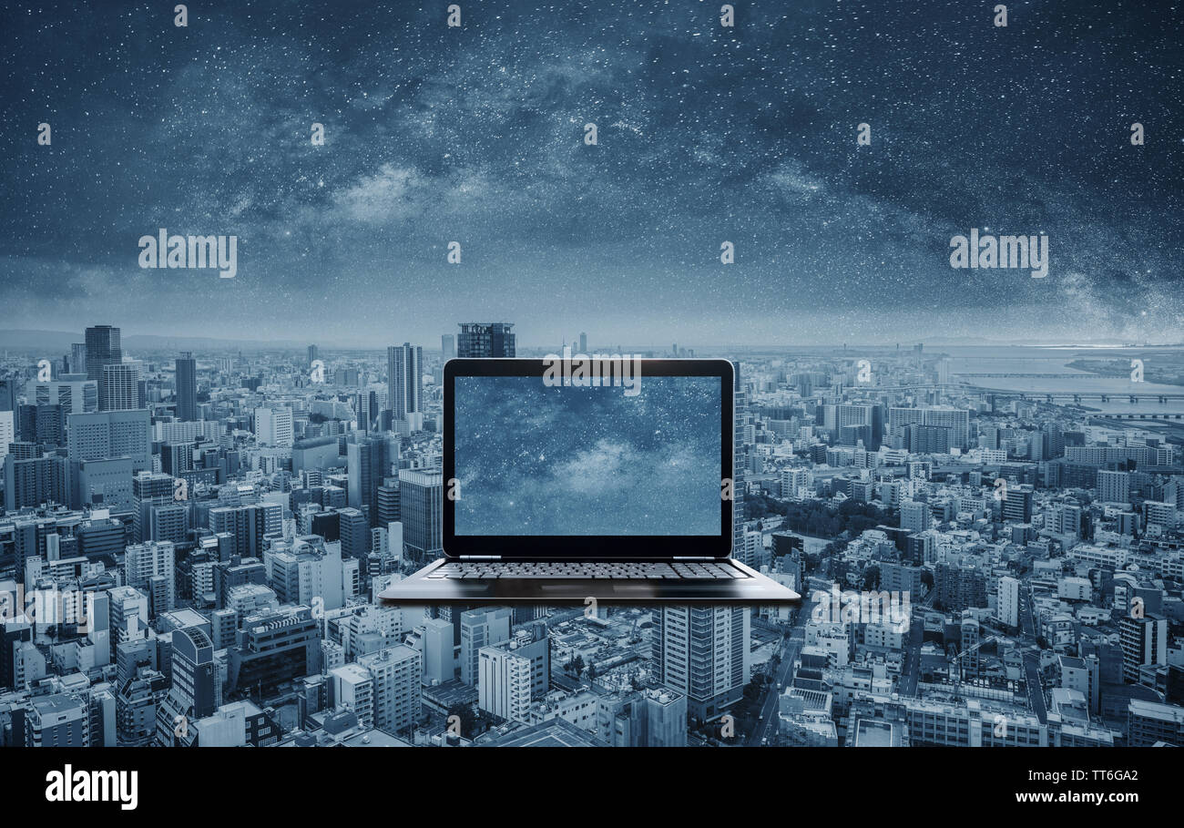 Computer laptop with futuristic city background. Computer laptop ...