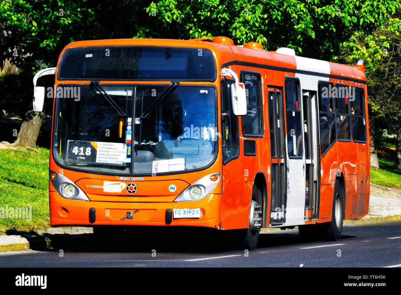 SANTIAGO, CHILE - OCTOBER 2014: A public transport bus during its route ...