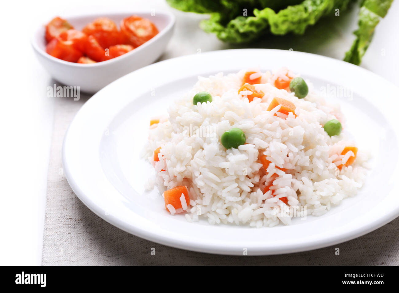 Vegetable rice served on table, close-up Stock Photo - Alamy