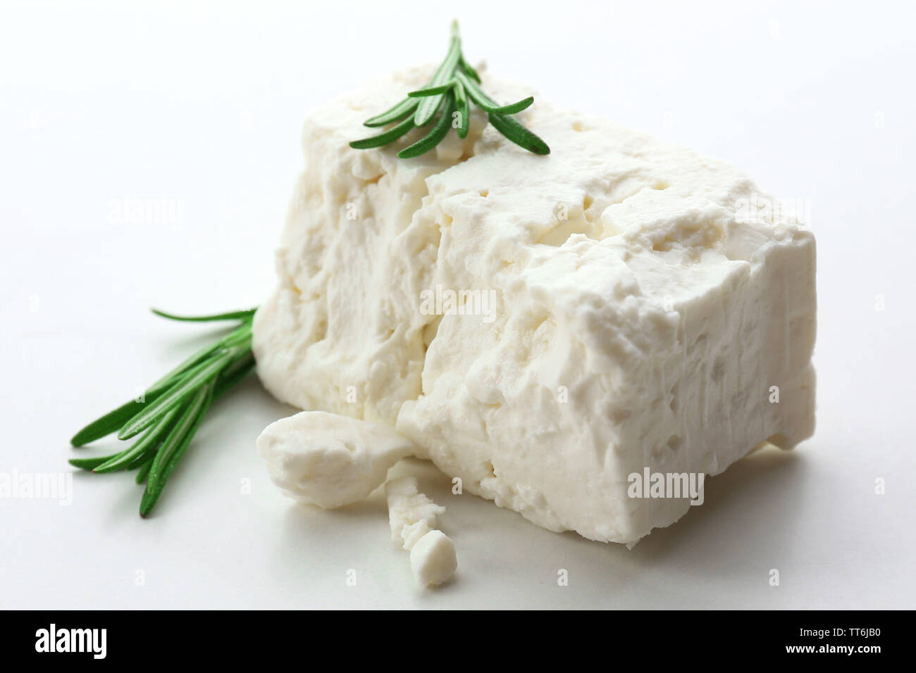 Feta cheese isolated on white Stock Photo - Alamy