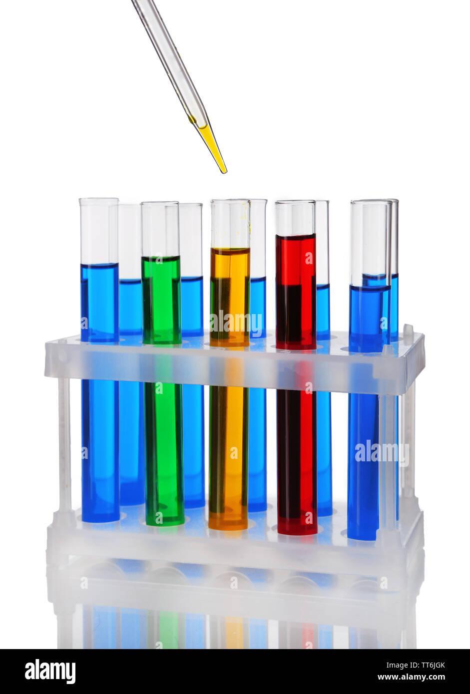 Pipette with drop of color liquid over container tubes isolated on ...