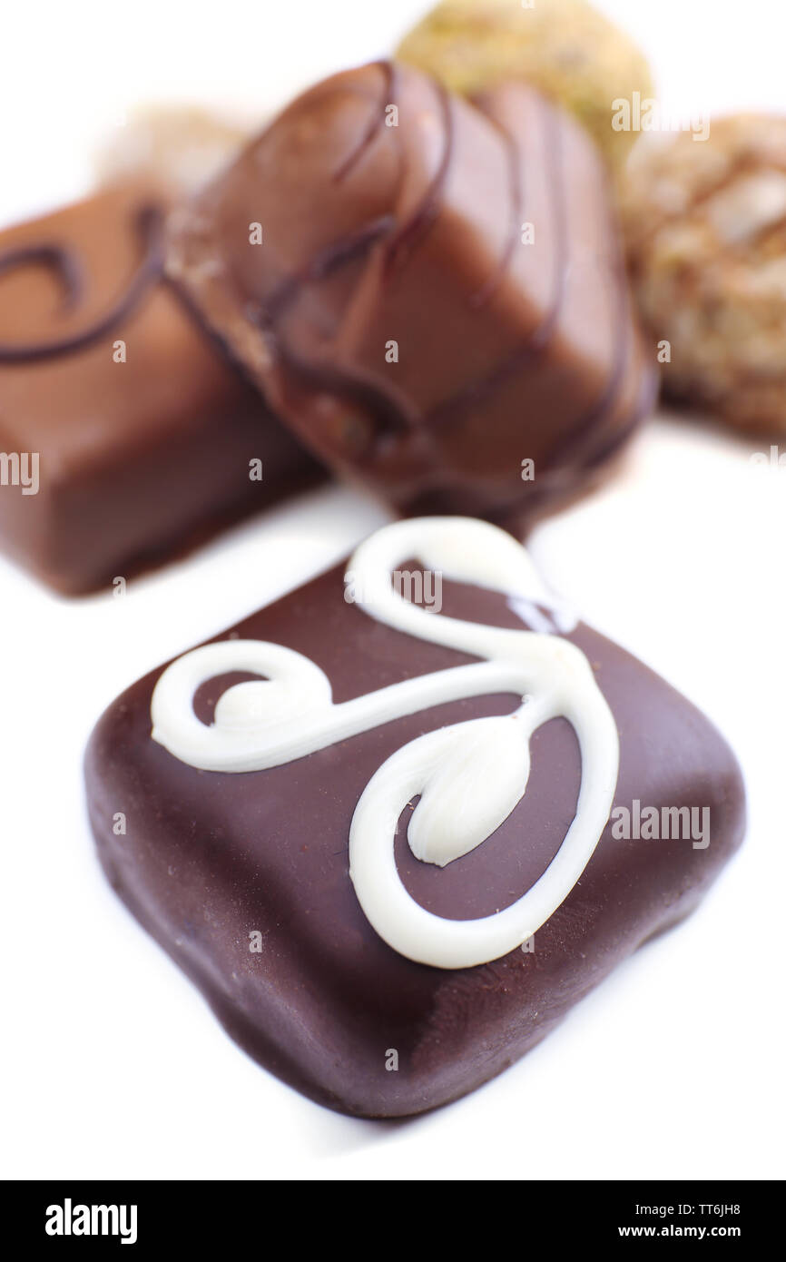 Sweet chocolate candies isolated on white background Stock Photo - Alamy