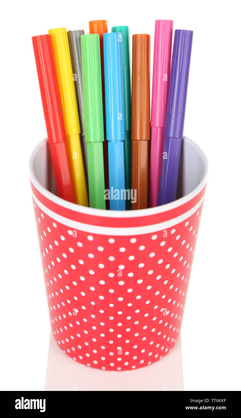 Colorful markers in red polka-dot plastic cup isolated on white ...