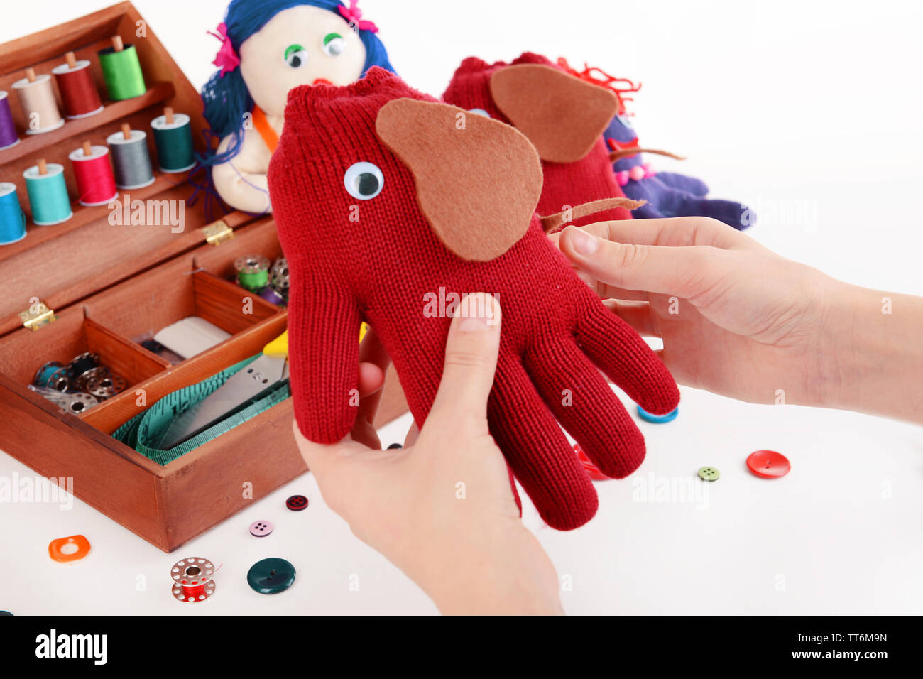 Making of handmade toys from gloves on white background Stock Photo - Alamy