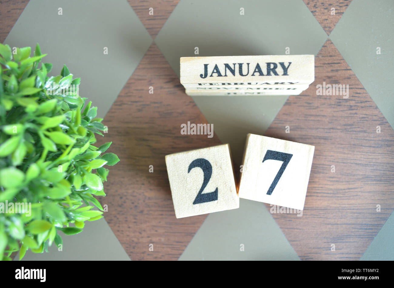 Date of February month with leaf on diamond pattern table for ...