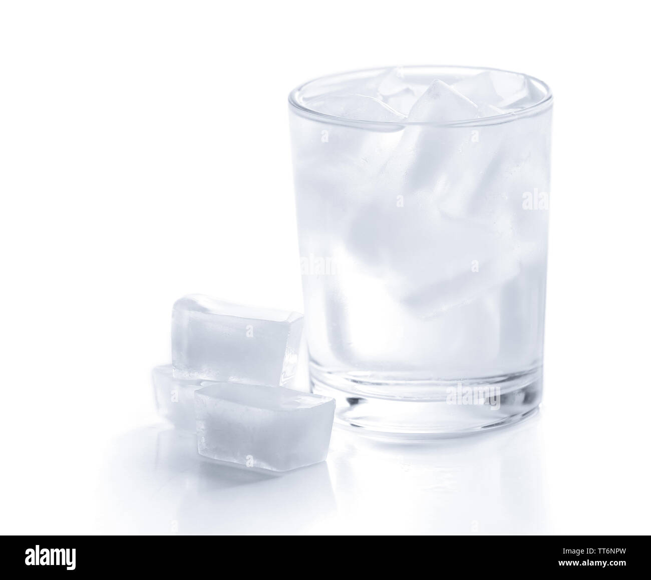 Glass with ice cubes isolated on white Stock Photo - Alamy