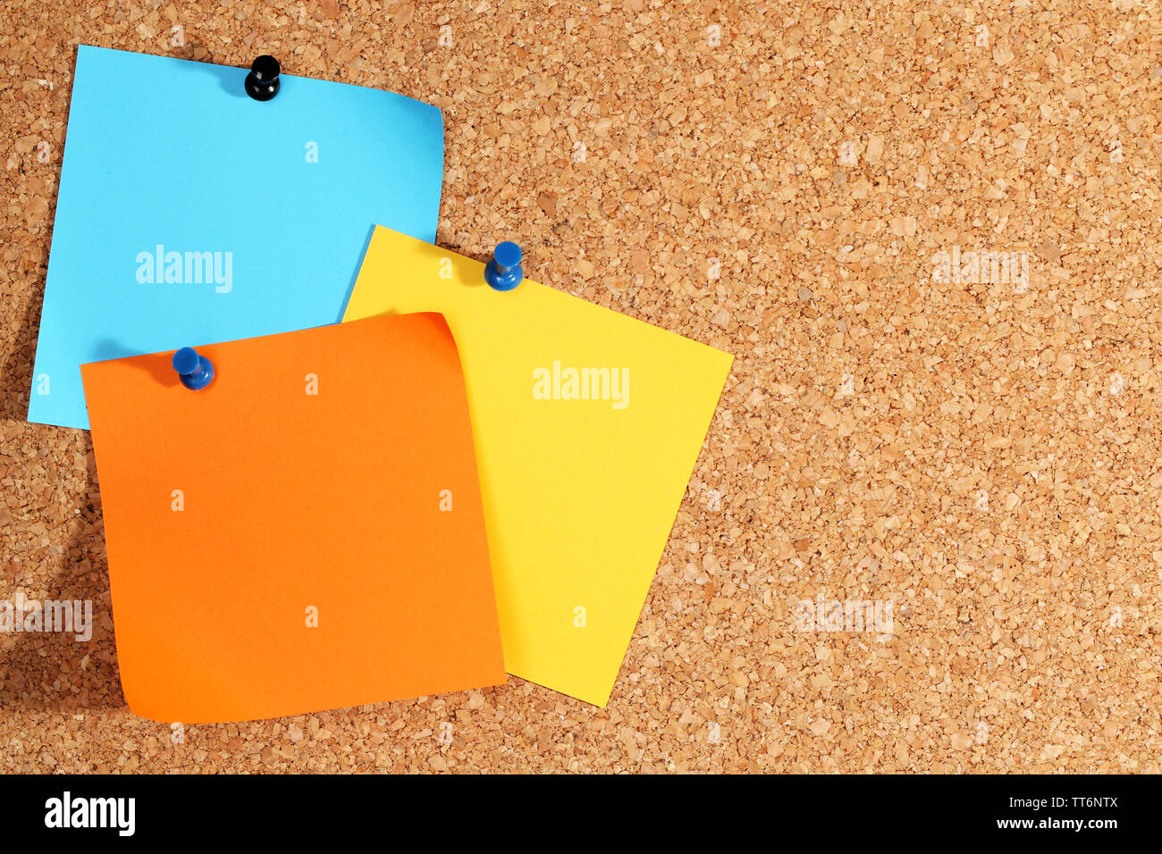 Colorful stickers on wooden background Stock Photo - Alamy