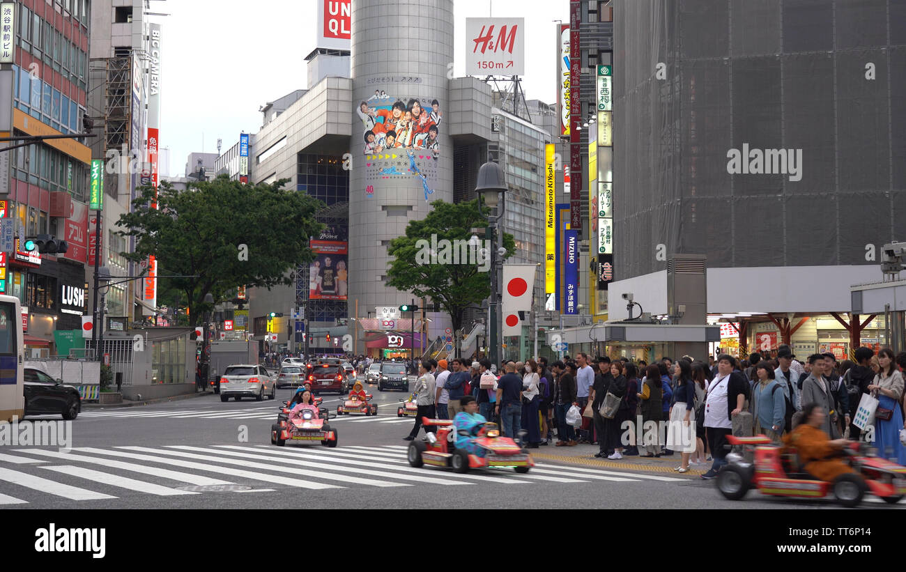 Mario kart running on Shibuya Crossing ( 4K UHD ). Tourist rent a Go ...
