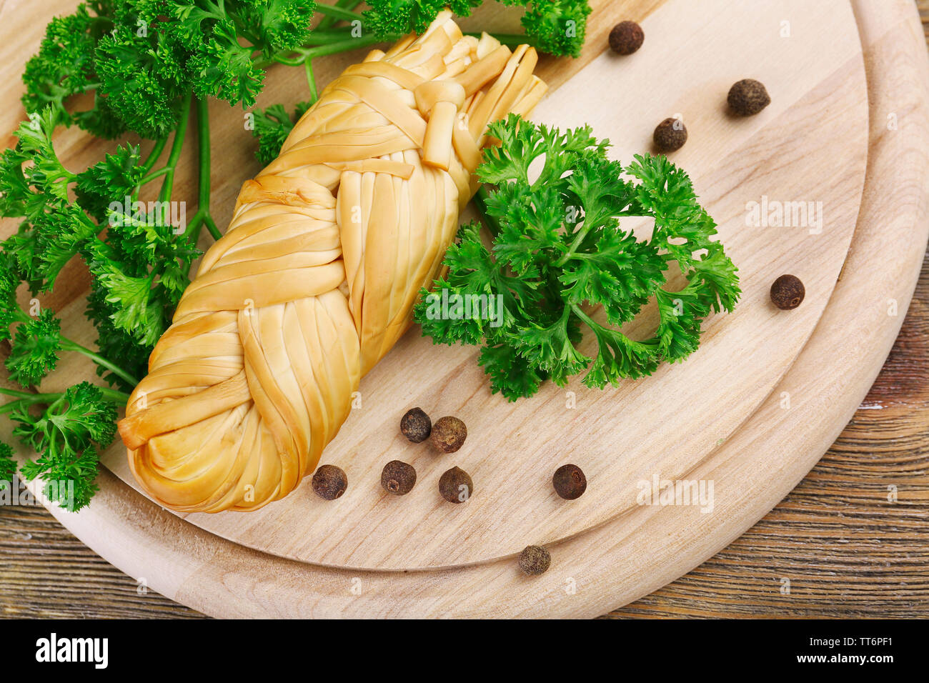 Smoked braided cheese close-up Stock Photo - Alamy