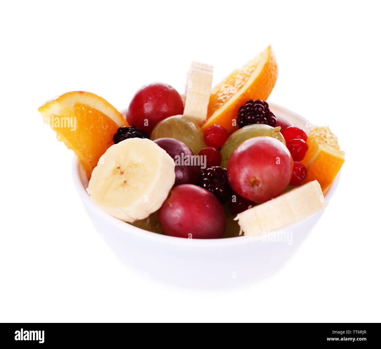 Mix of fruit in bowl isolated on white Stock Photo - Alamy