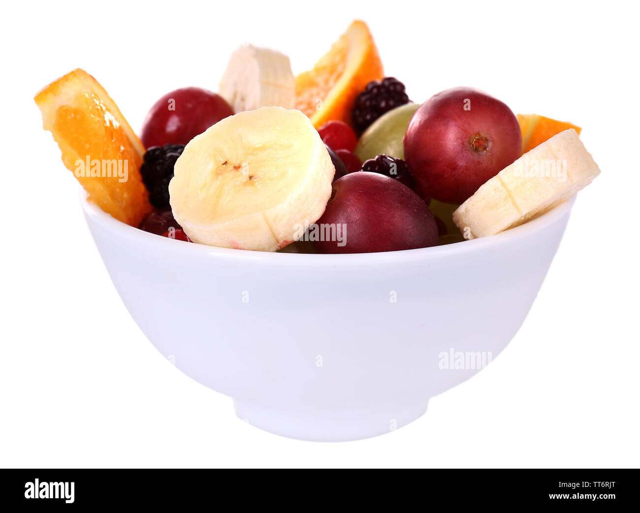 Mix of fruit in bowl isolated on white Stock Photo - Alamy