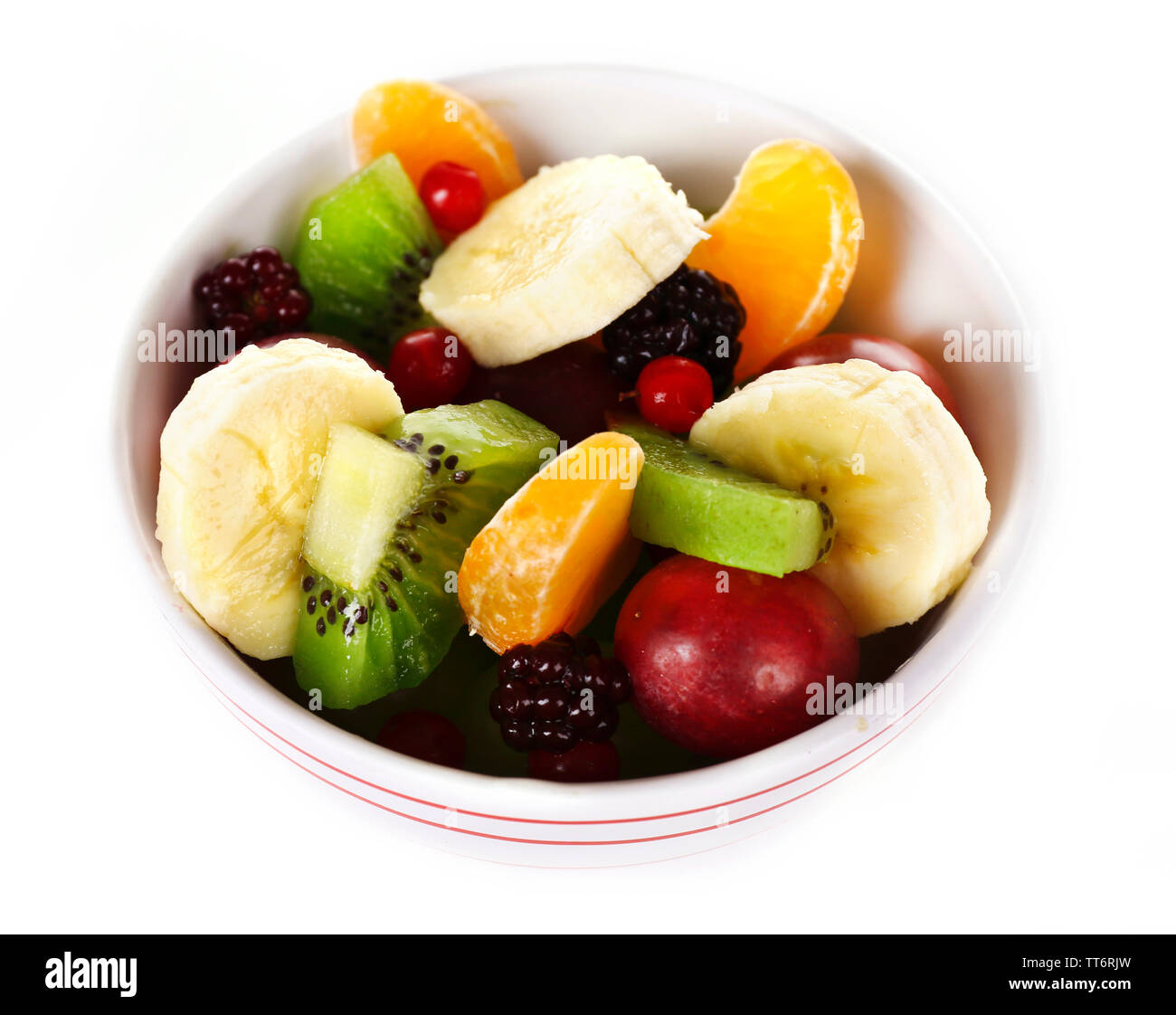 Mix of fruits in bowl isolated on white Stock Photo - Alamy