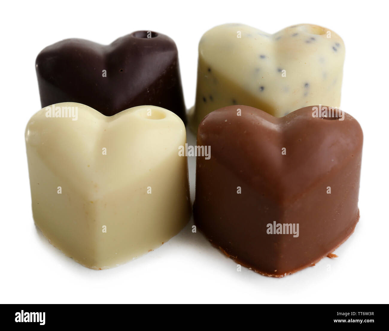 Delicious chocolate candies isolated on white Stock Photo - Alamy
