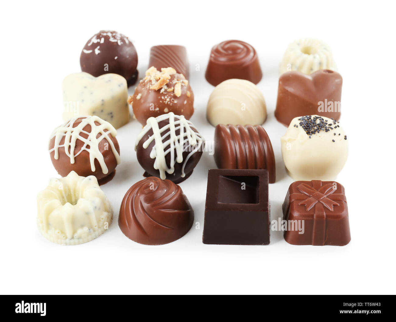 Delicious chocolate candies isolated on white Stock Photo - Alamy