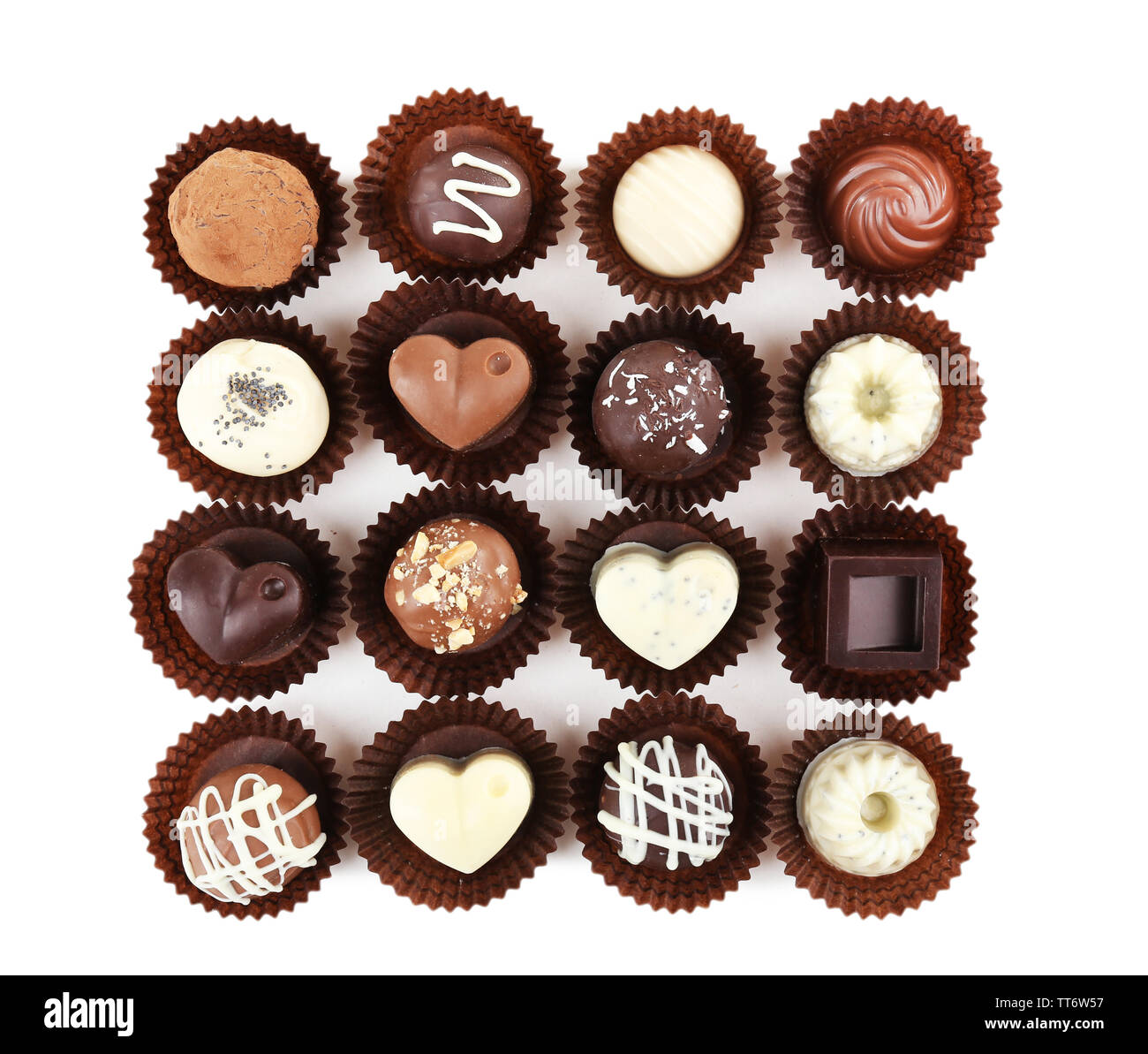 Delicious chocolate candies isolated on white Stock Photo - Alamy