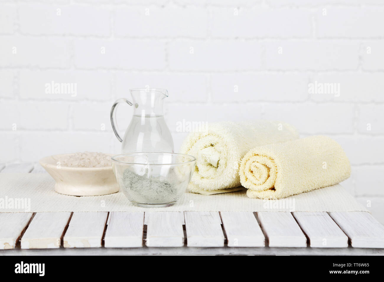 Spa treatment on color wooden table, on light background Stock Photo ...