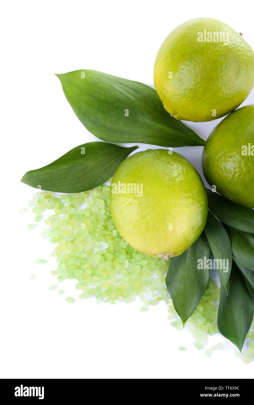 Fresh lime with sea crystals isolated on white Stock Photo - Alamy