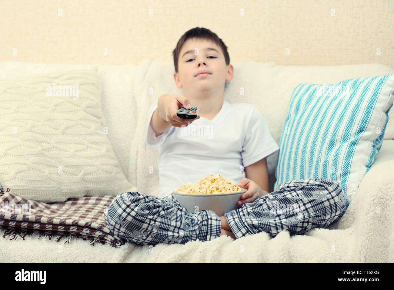 Boy watching TV Stock Photo - Alamy