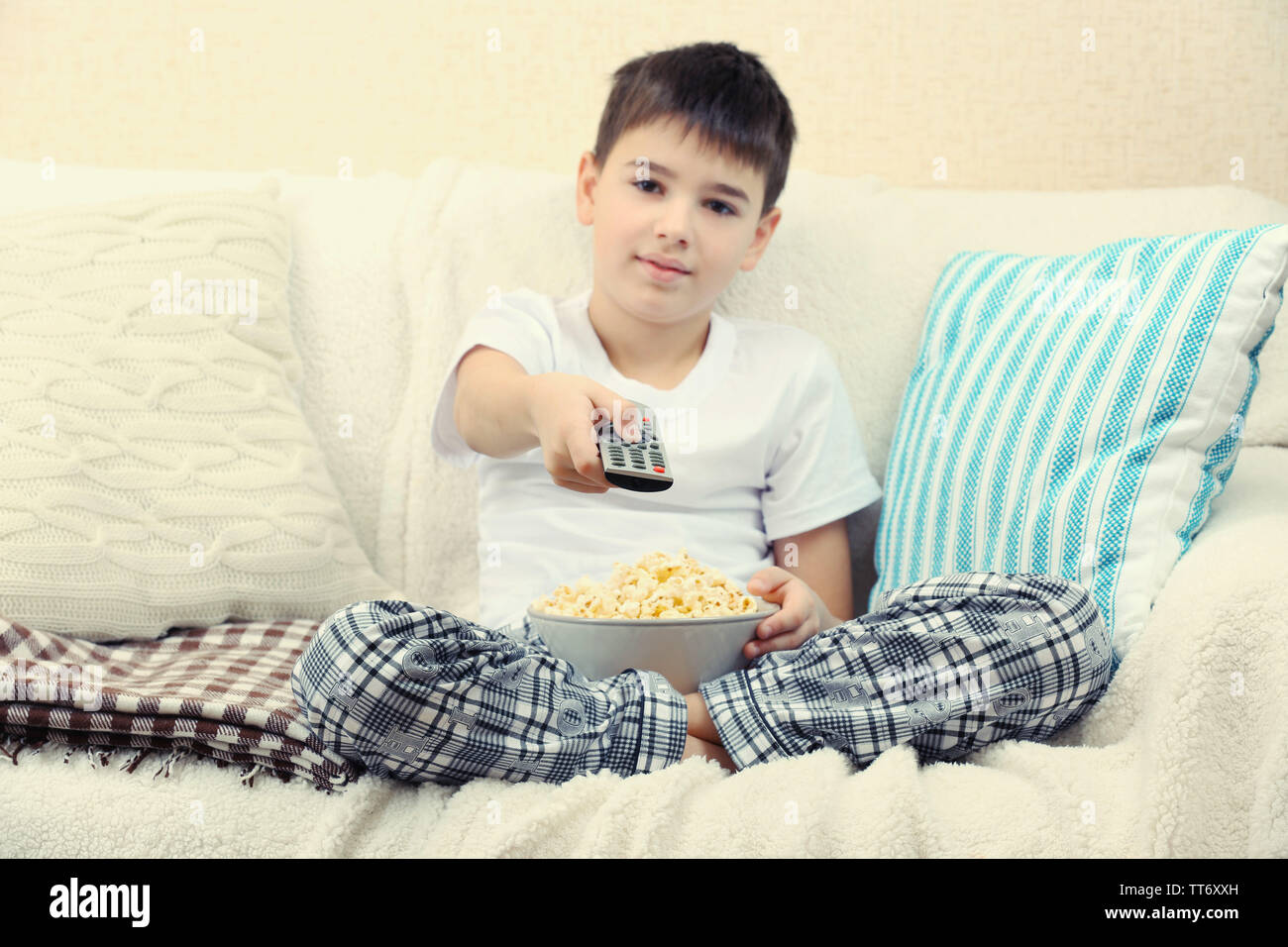 Boy watching TV Stock Photo - Alamy