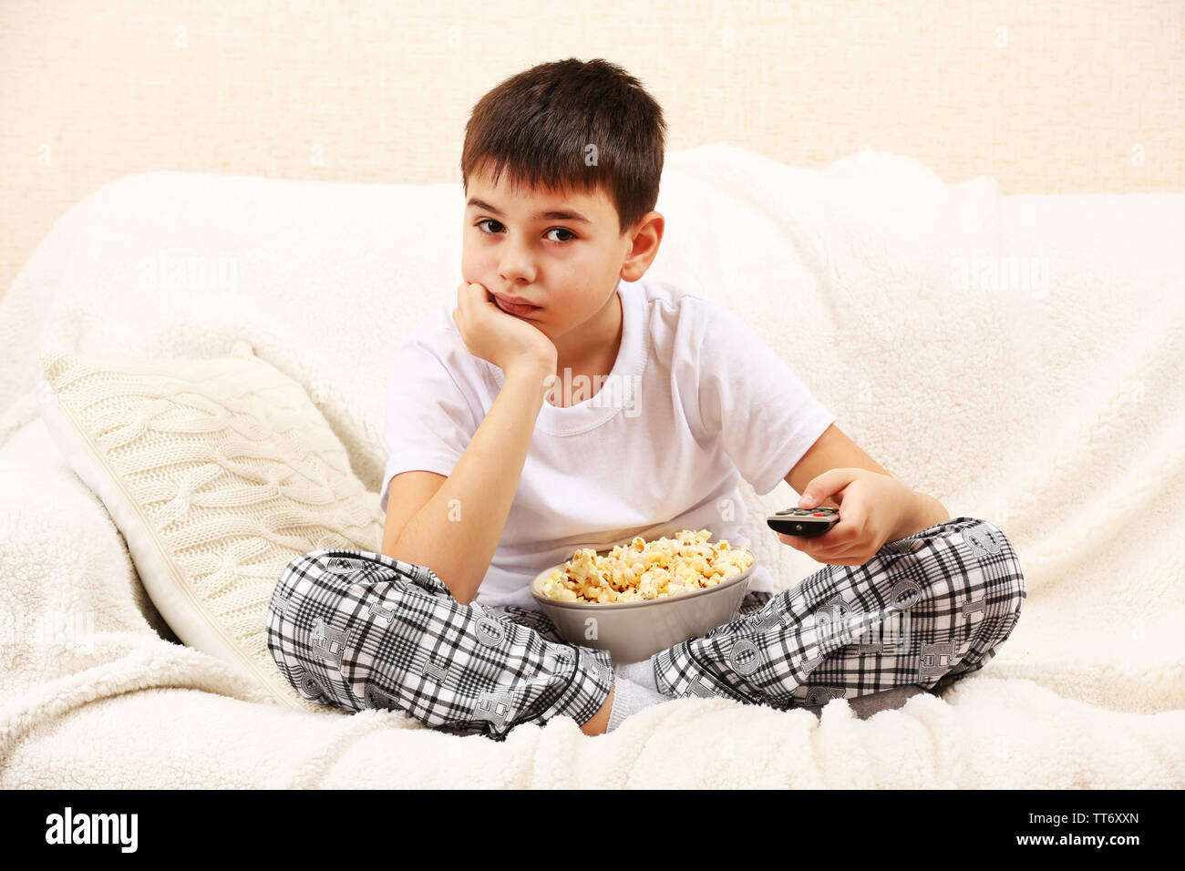 Boy watching TV Stock Photo - Alamy