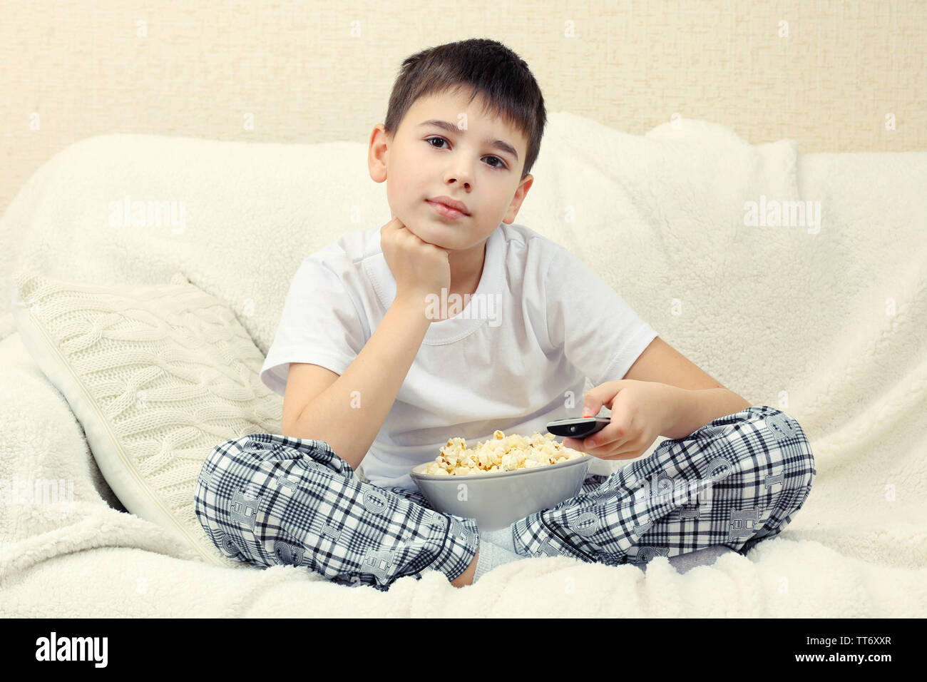 Boy watching TV Stock Photo - Alamy